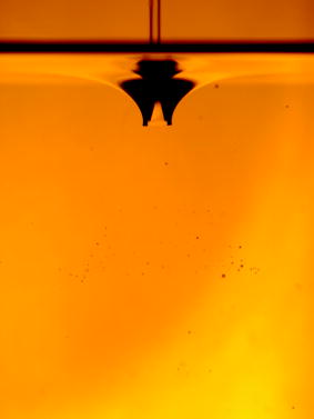 Viscous jet drawing air into a bath | Physics of Fluids | AIP Publishing