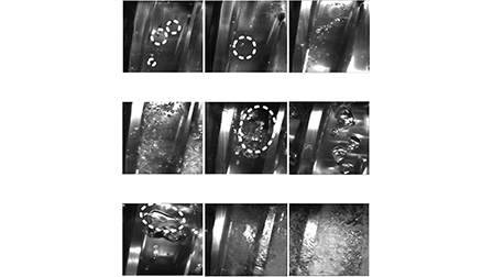 Gas–liquid separation mechanisms and bubble dynamics in a helical axial ...