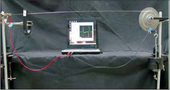 Pulse speed on a plucked wire | The Physics Teacher | AIP Publishing