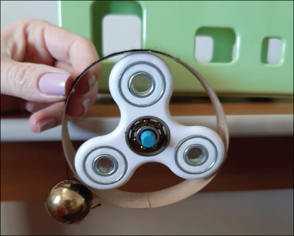 Low-Cost Experiment to Determine the Moment of Inertia of the Fidget ...
