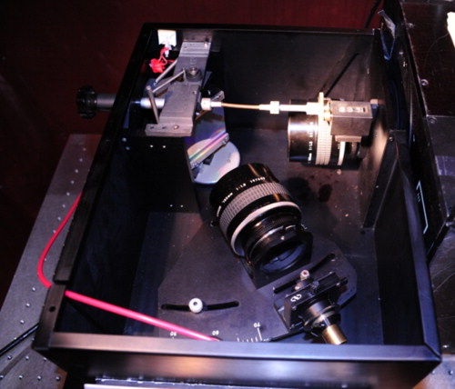 Time-resolved spectra of dense plasma focus using spectrometer, streak ...