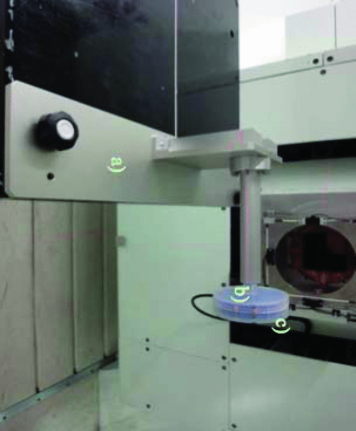 An isocenter detection and verification device for use in proton ...