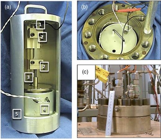An in situ tensile test apparatus for polymers in high pressure ...