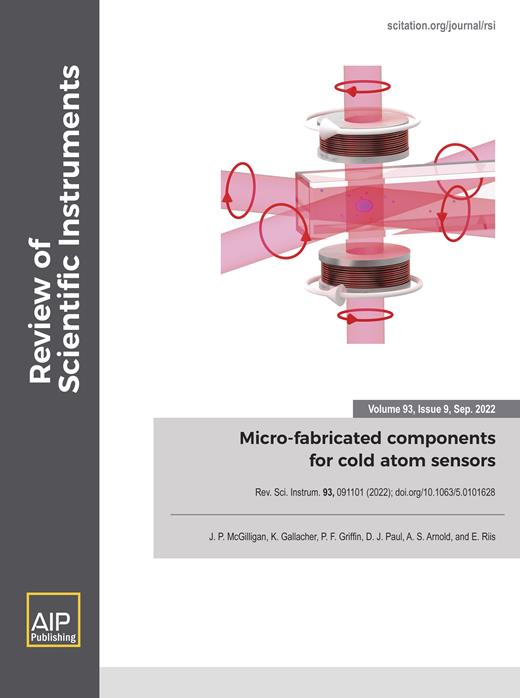 A piezoelectric rotatable magnetic force microscope system in a 10 T ...